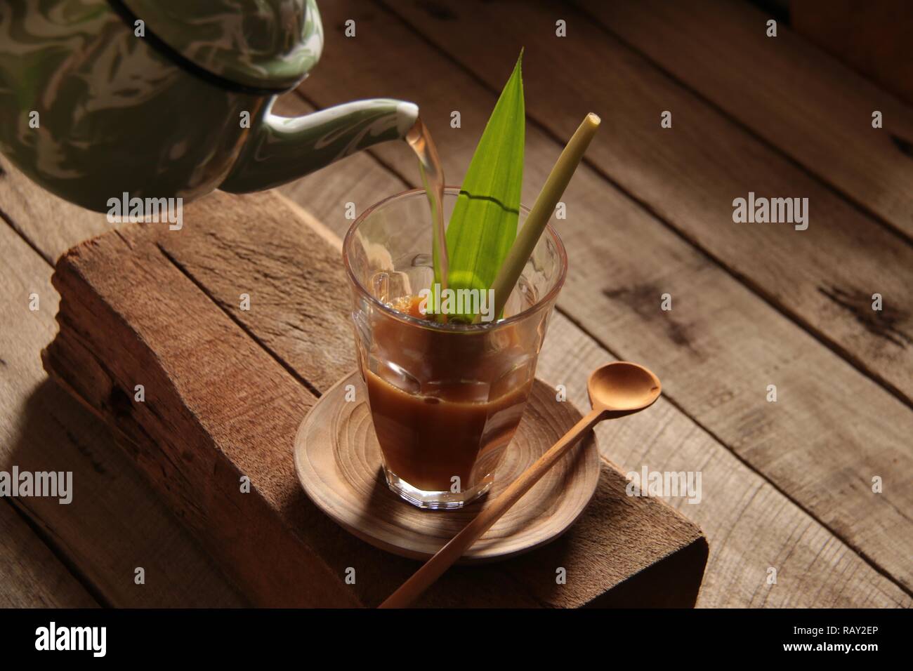 Bandrek. Traditional Sundanese herbal tea latte from Bandung, West Java ...