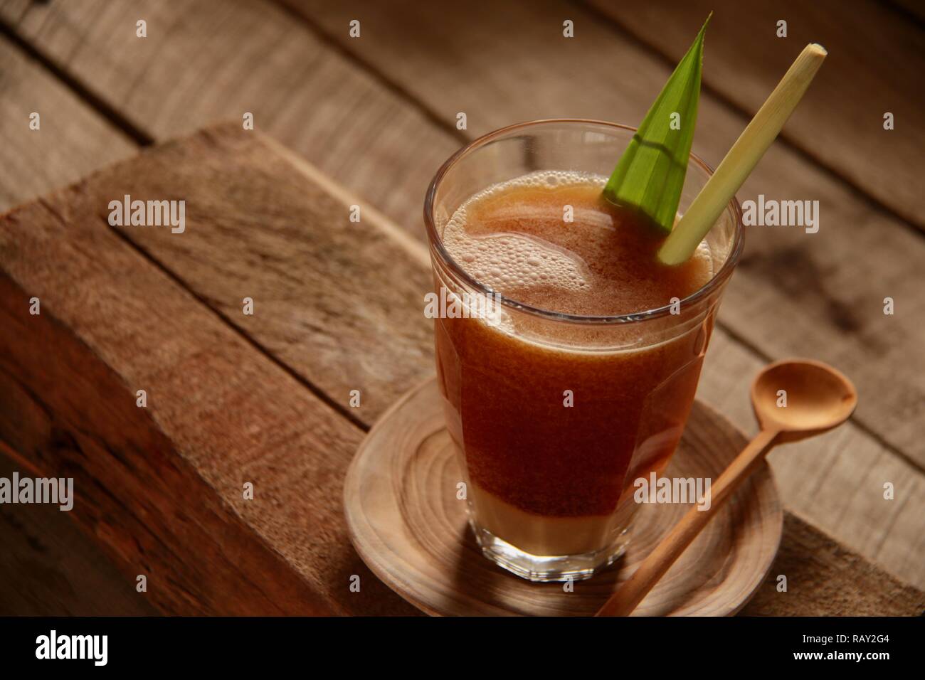 Bandrek. Traditional Sundanese herbal tea latte from Bandung, West Java ...