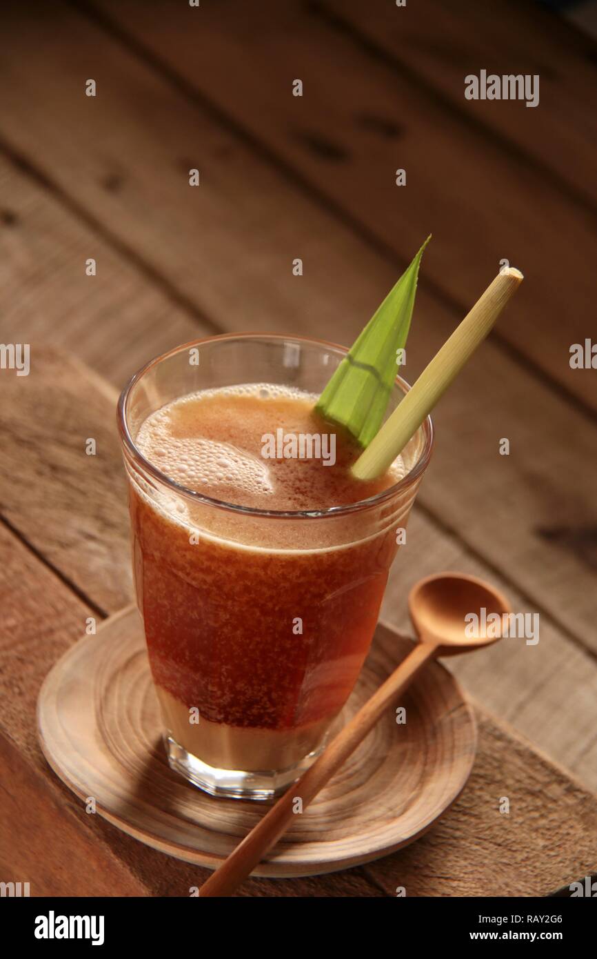 Bandrek. Traditional Sundanese herbal tea latte from Bandung, West Java ...