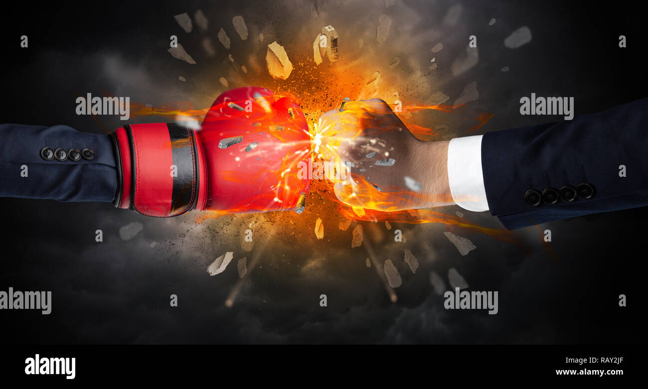 Two hands fighting and breaking a rock into small pieces Stock Photo ...