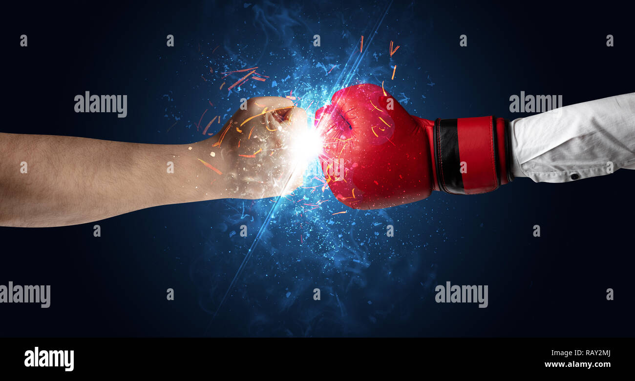 Two hands fighting with light, glow, spark and smoke concept Stock ...