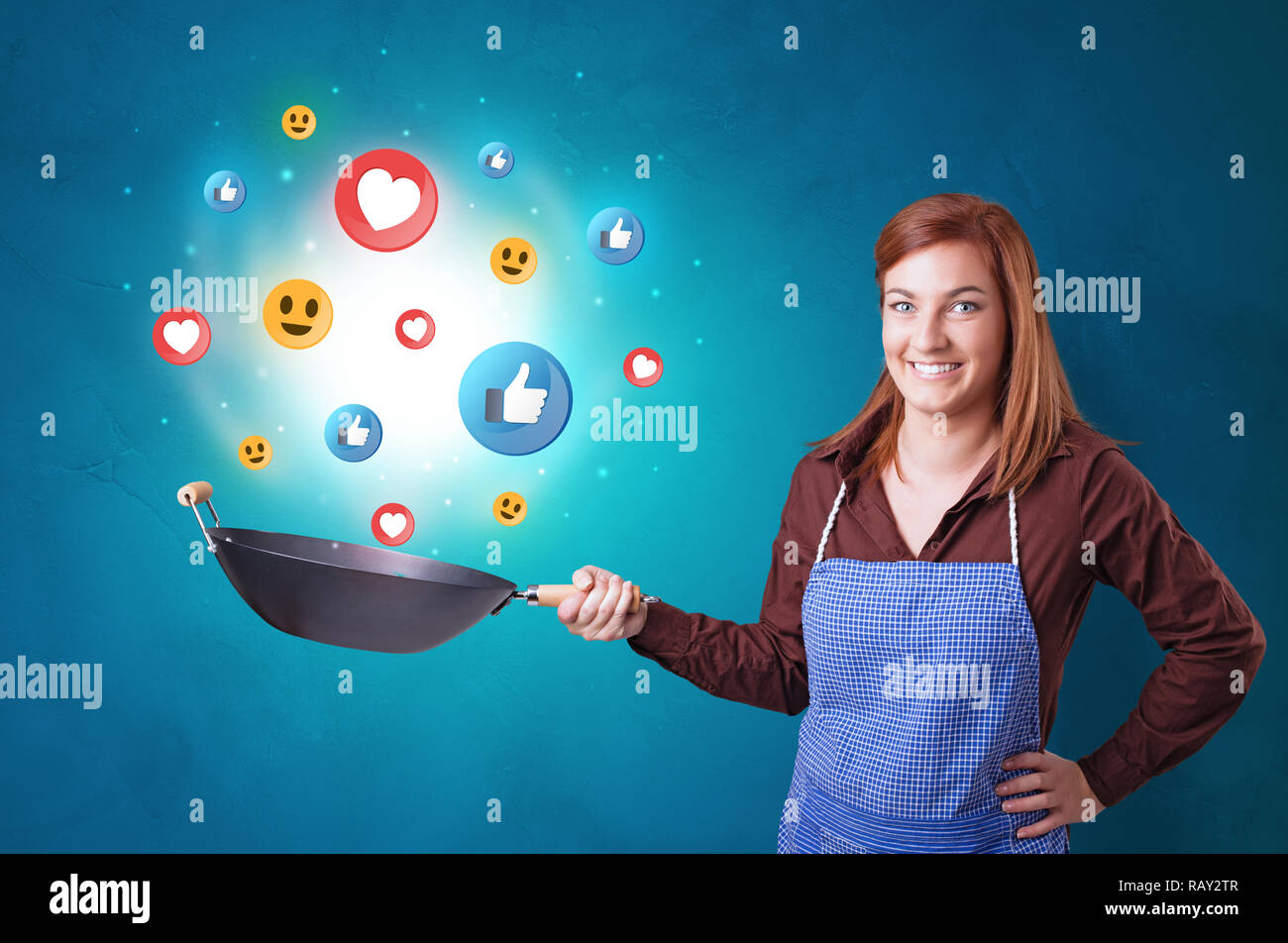 Young happy person cooking social media concept in wok Stock Photo - Alamy