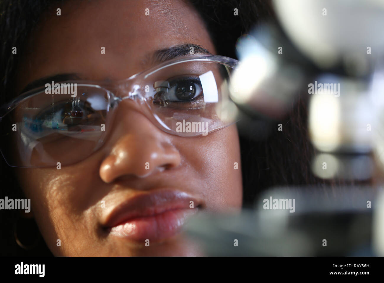 Black female chemist student conducting research Stock Photo - Alamy