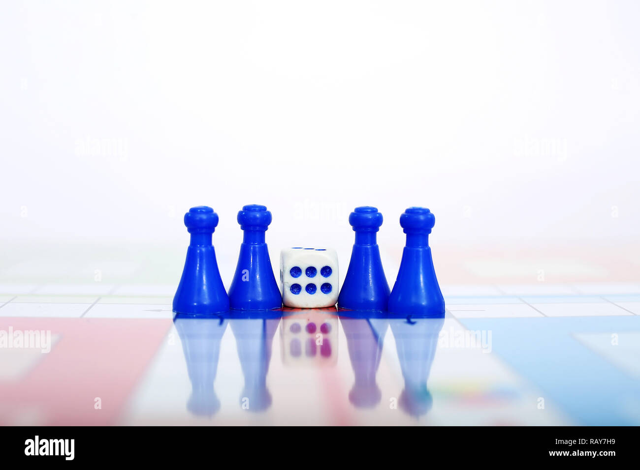 Picture of blue tokens with dice Stock Photo - Alamy