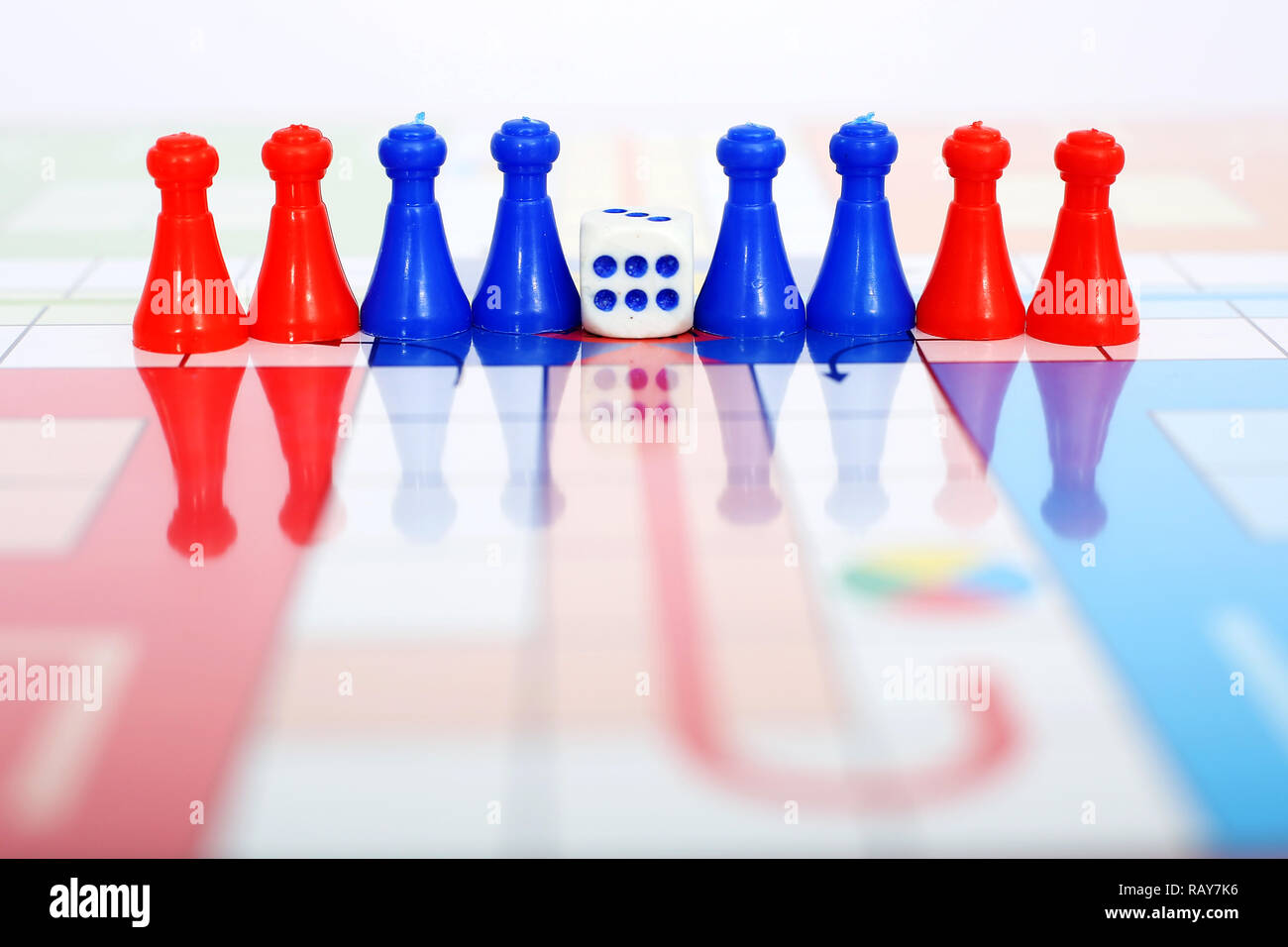 Picture of red and blue tokens with dice Stock Photo - Alamy