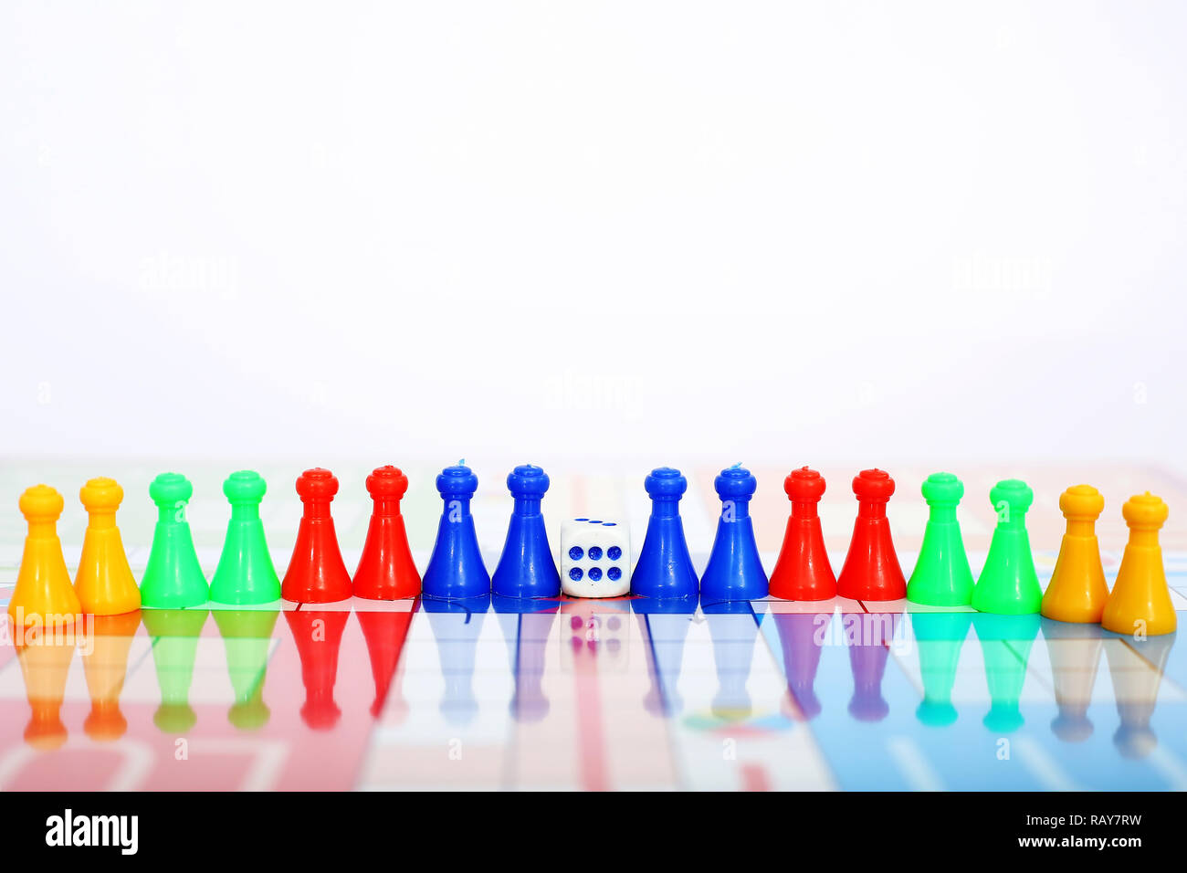 Picture of colorful tokens with dice Stock Photo - Alamy