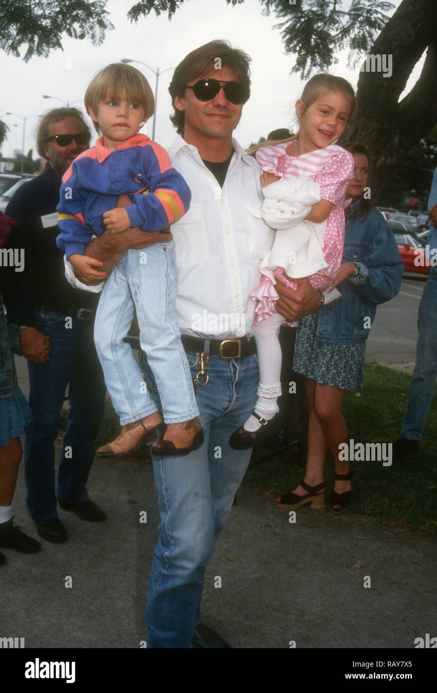 WESTWOOD, CA - JULY 24: Actor Alex McArthur and children attend 'Tom & Jerry: The Movie ...