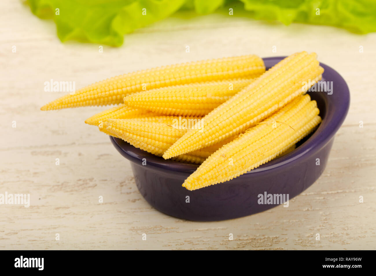 Young raw baby corn Stock Photo - Alamy