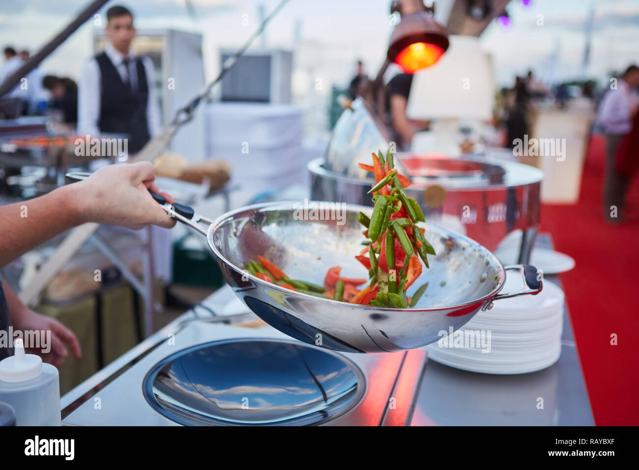 Wok toss hi-res stock photography and images - Alamy