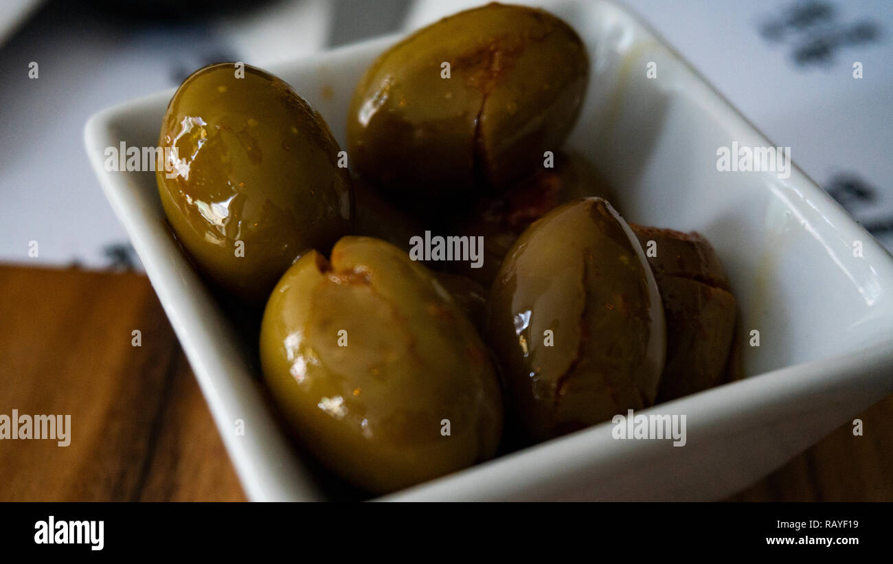 White plate antipasti olives hi-res stock photography and images - Alamy