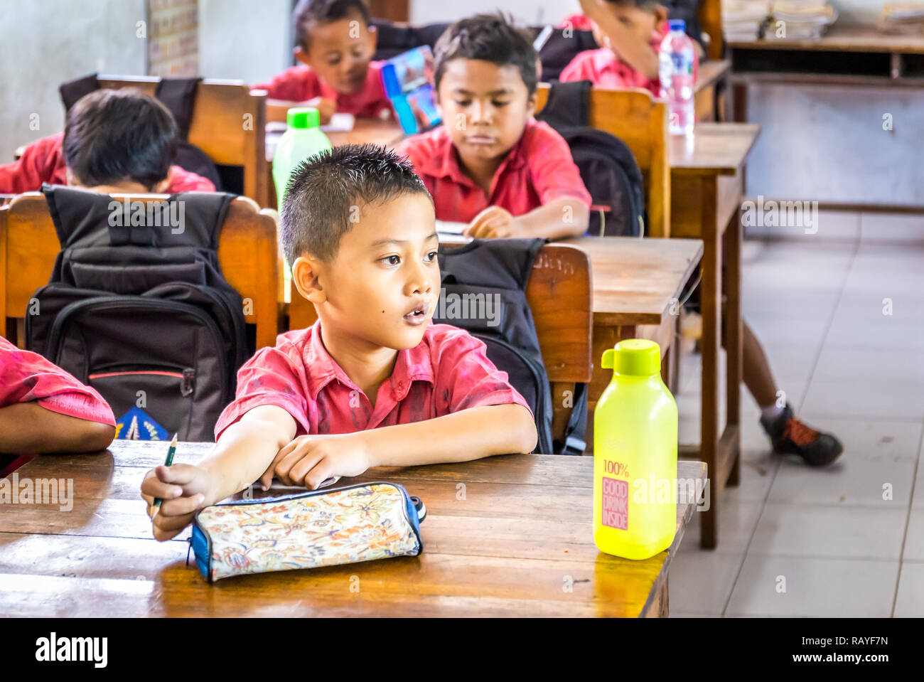 BALI, INDONESIA - APRIL 25, 2018: Young happy pupils wearing balinese ...