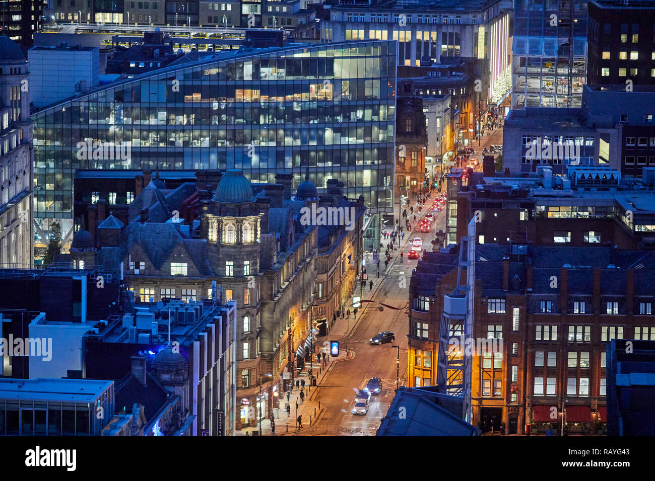 Manchester at night looking down Deansgate frame by the modern RBS bank ...