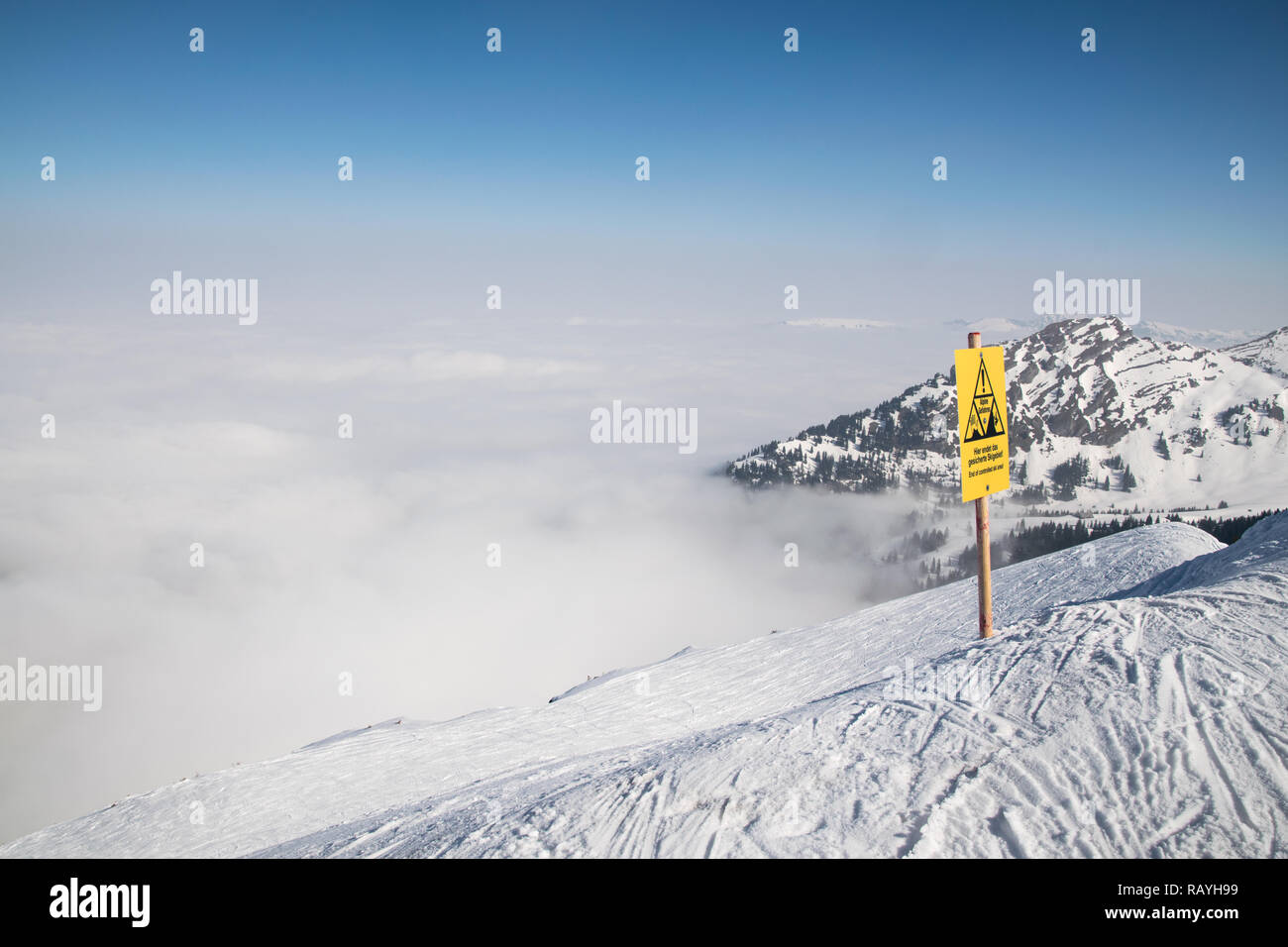 Danger sign white mountains hi-res stock photography and images - Alamy