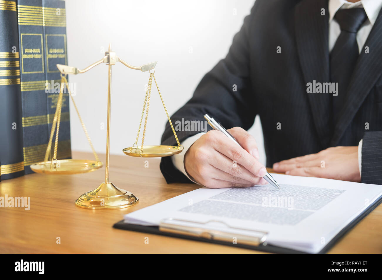 tribunal Attorney lawyer working with documents and wooden gavel on ...