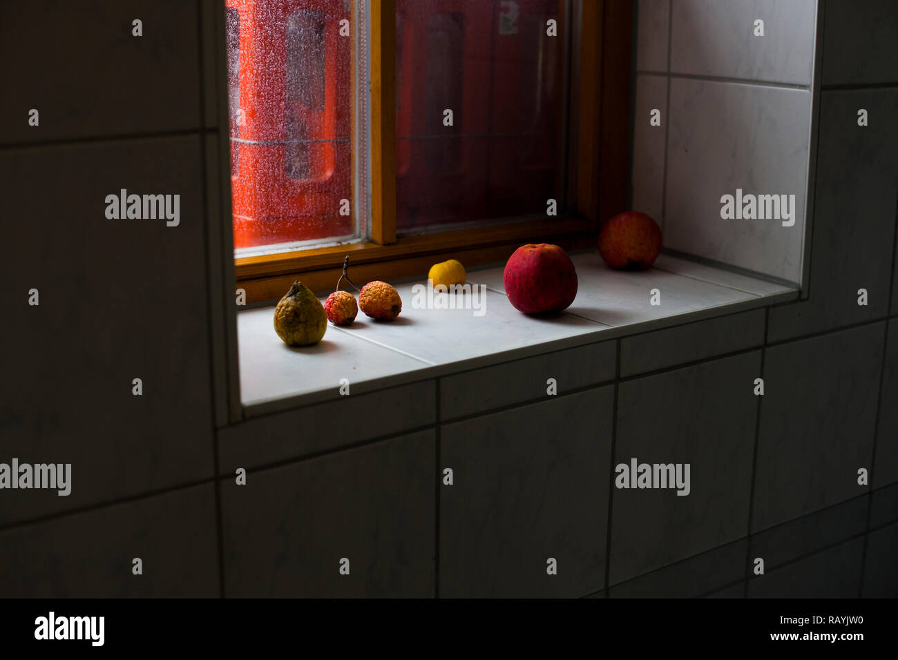 Old apples lying in the window Stock Photo - Alamy