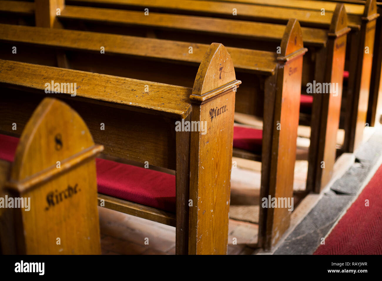 Empty wooden church benches hi-res stock photography and images - Alamy