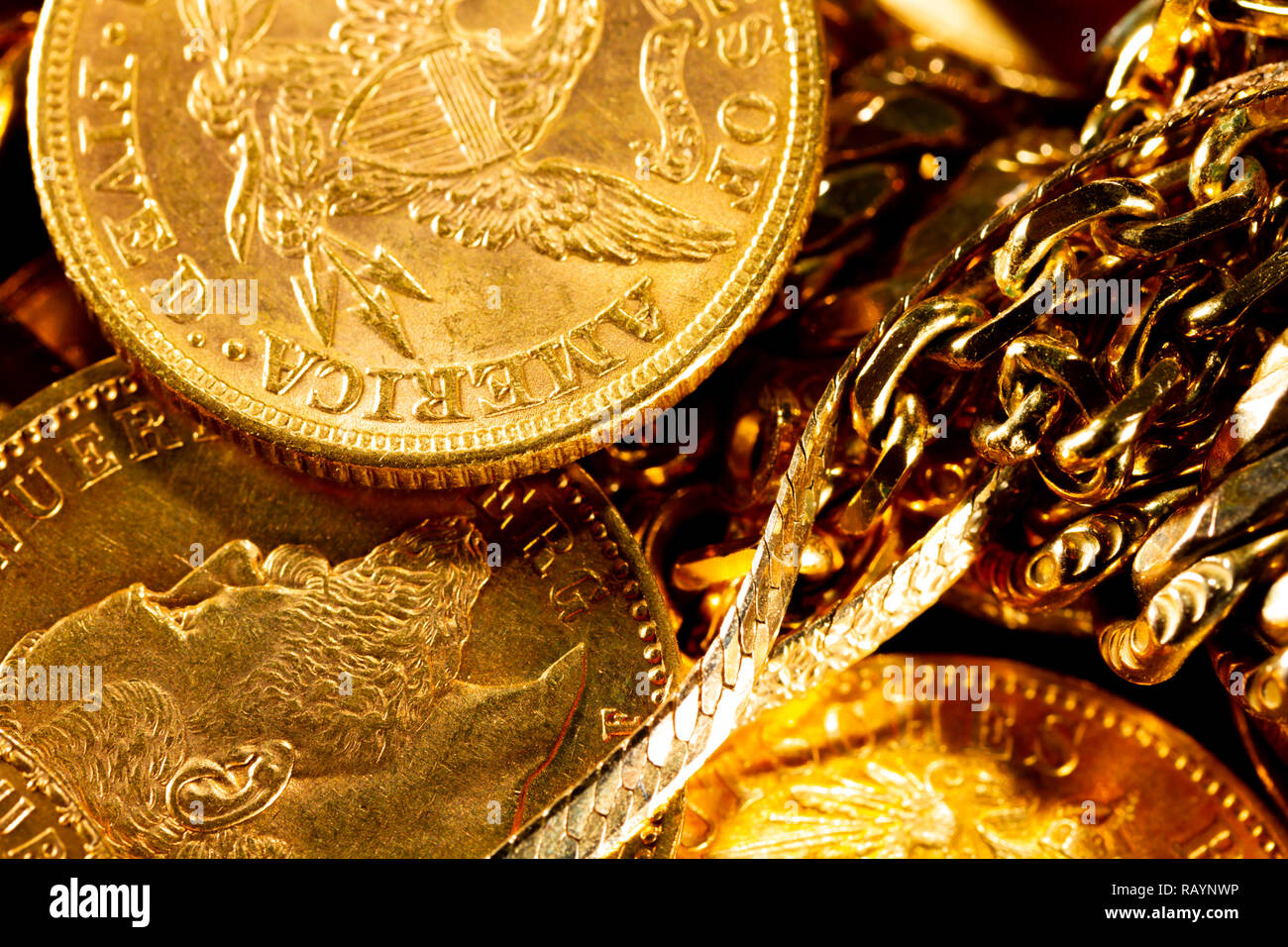 Real Gold coins over dark background Stock Photo - Alamy