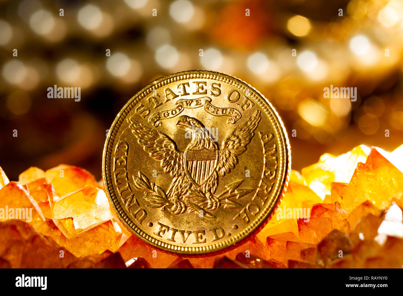Real Gold coins over dark background Stock Photo - Alamy