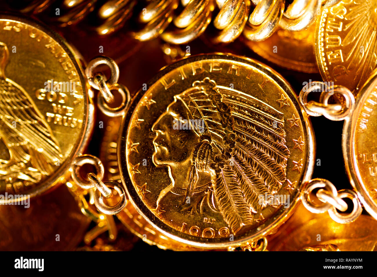 Real Gold coins over dark background Stock Photo - Alamy