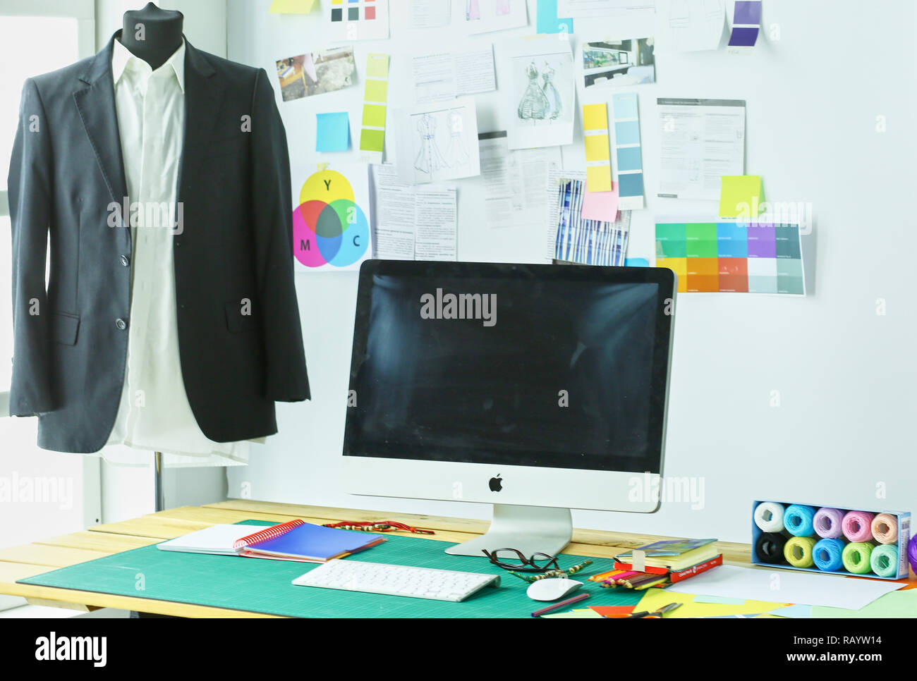 Empty workroom and workplace of tailor or vendor of clothes in small ...