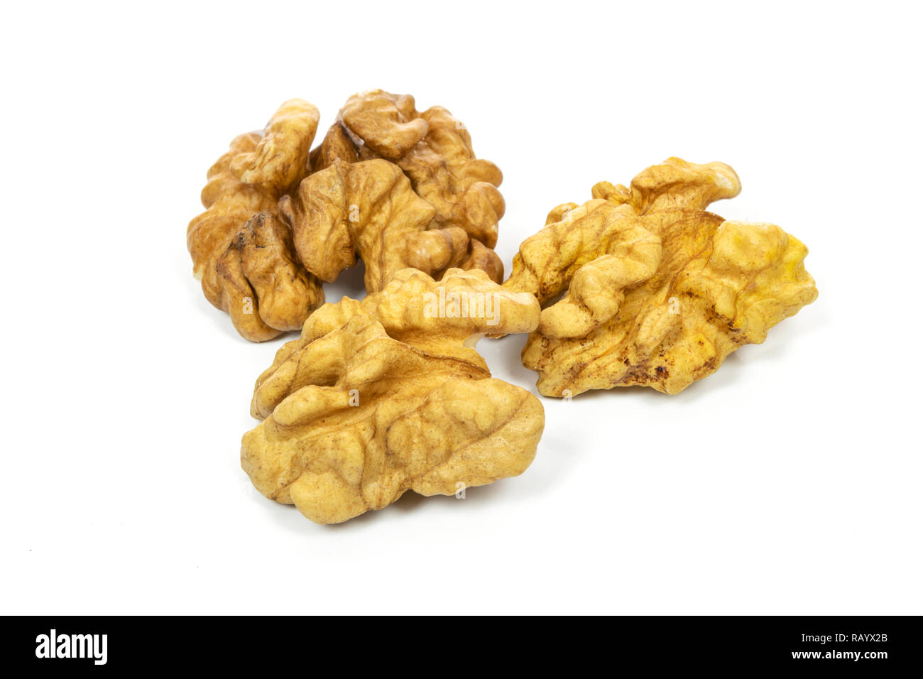 Dry and shelled walnuts isolated on a white background Stock Photo - Alamy