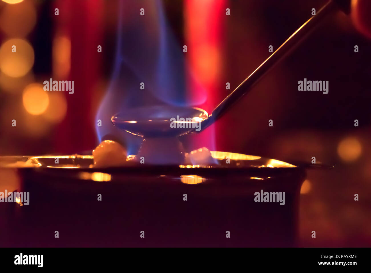 burnt punch: blue flame with colored fire background Stock Photo - Alamy