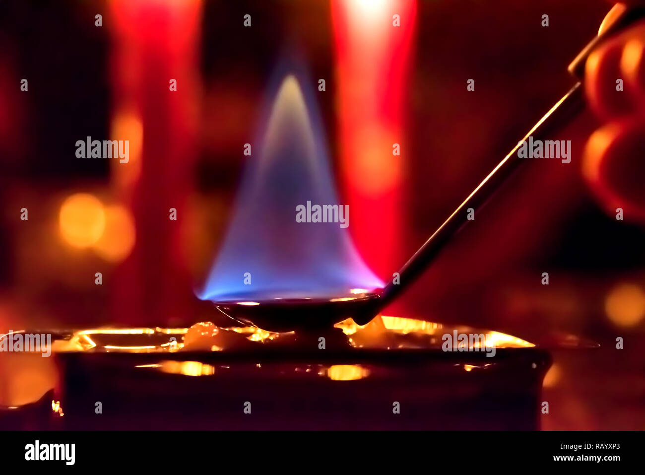 burnt punch: blue flame with colored fire background Stock Photo - Alamy