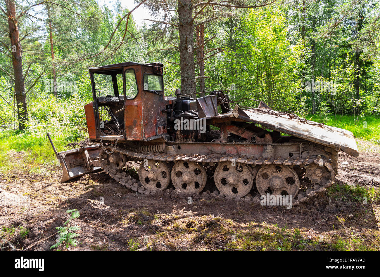 Old skidder at the forest in summertime. Skidding machine for timber ...