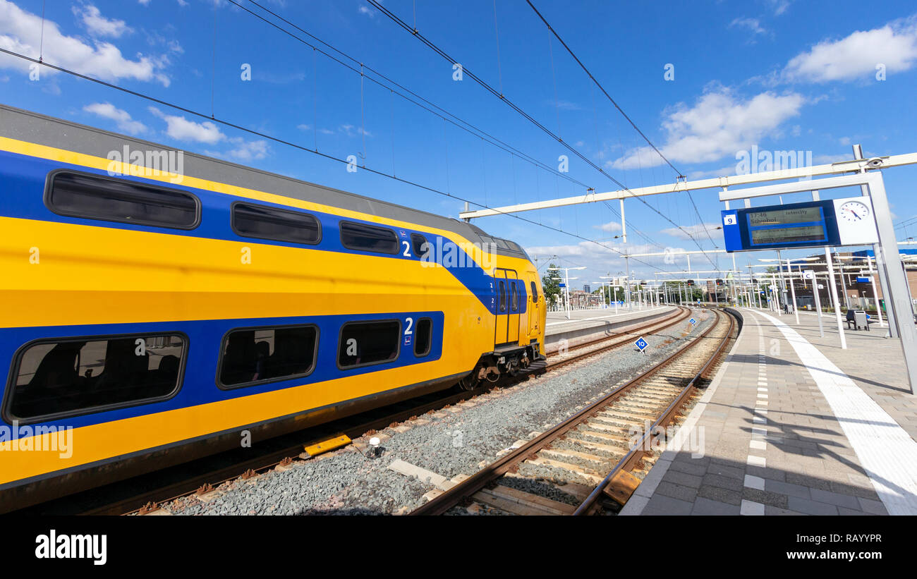 Dutch Intercity trains at the platform of a train station in The ...