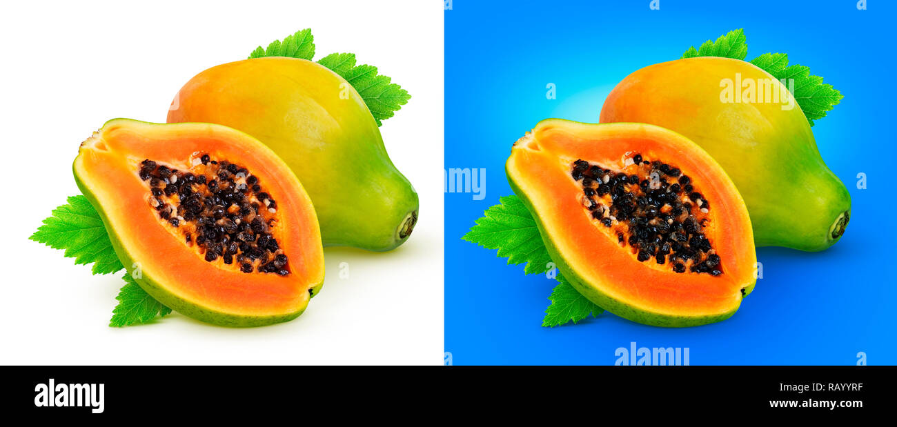 Whole and half of ripe papaya fruit isolated on white background with ...