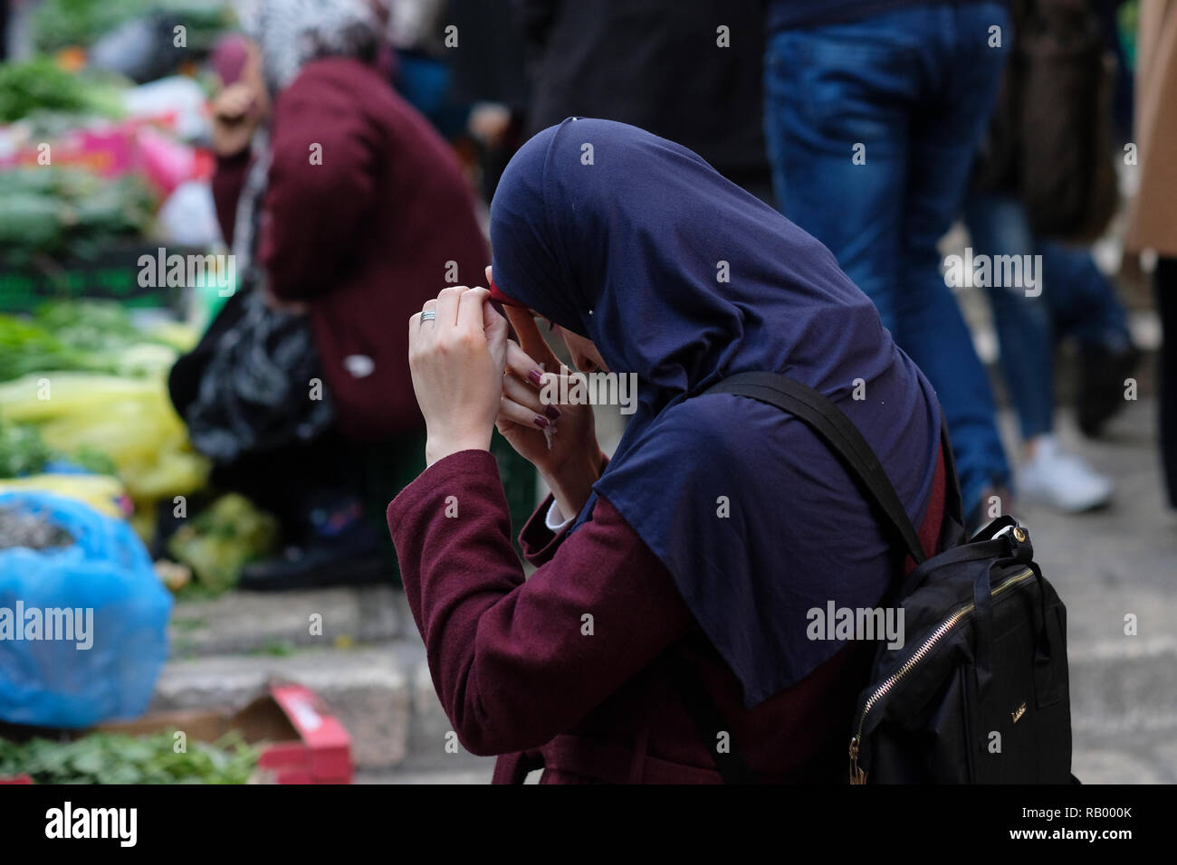 A Palestinian woman wearing a Hijab in the Muslim Quarter in the Old ...