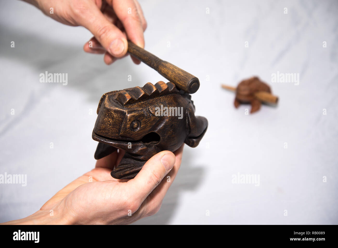 Frog-rattle isolated on a white background a symbol of wealth and ...