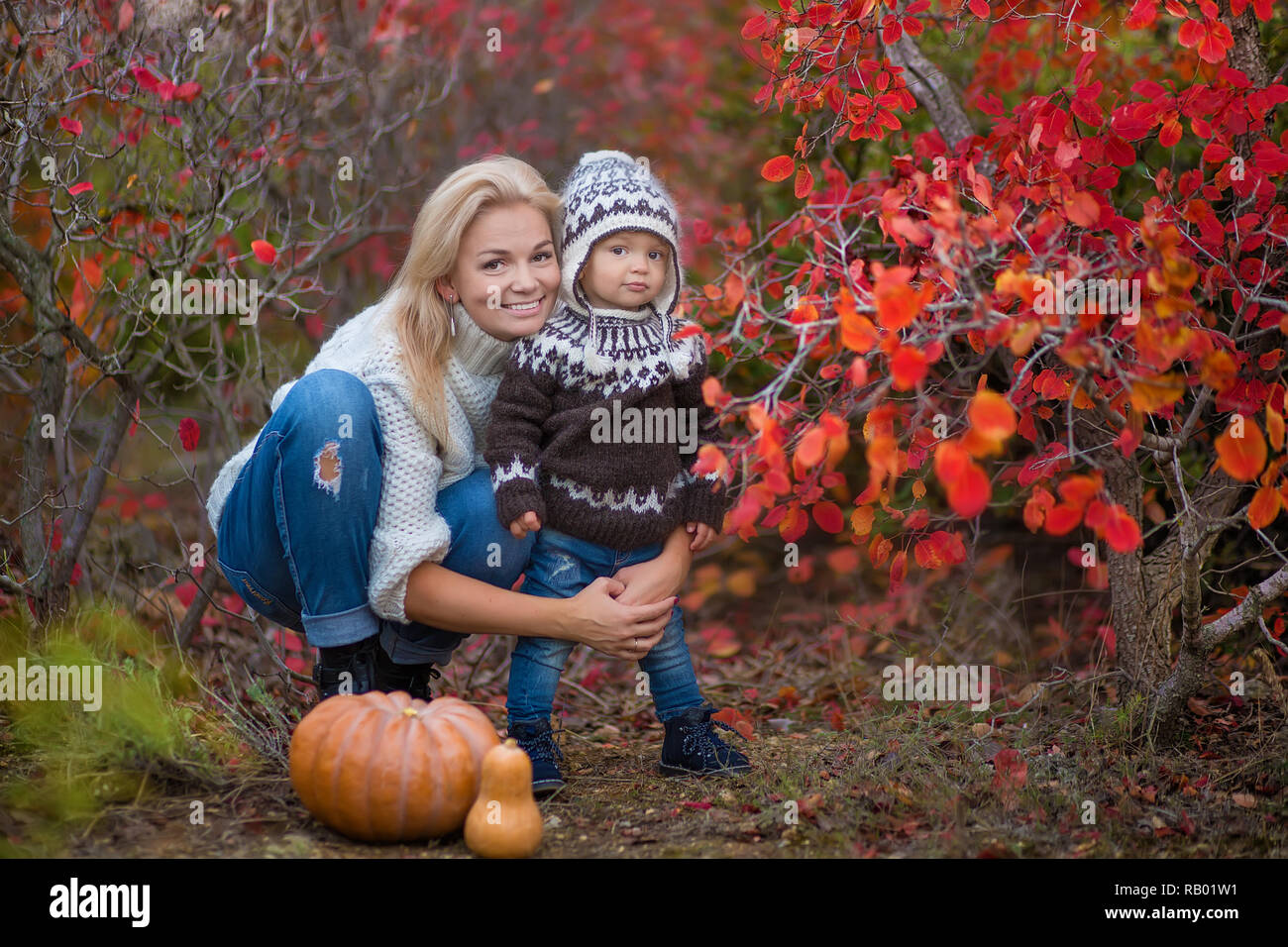 A young mother and her baby fall fun Stock Photo - Alamy