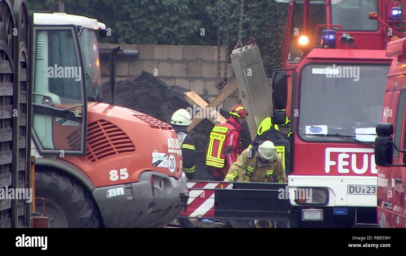 Buried under work hi-res stock photography and images - Alamy