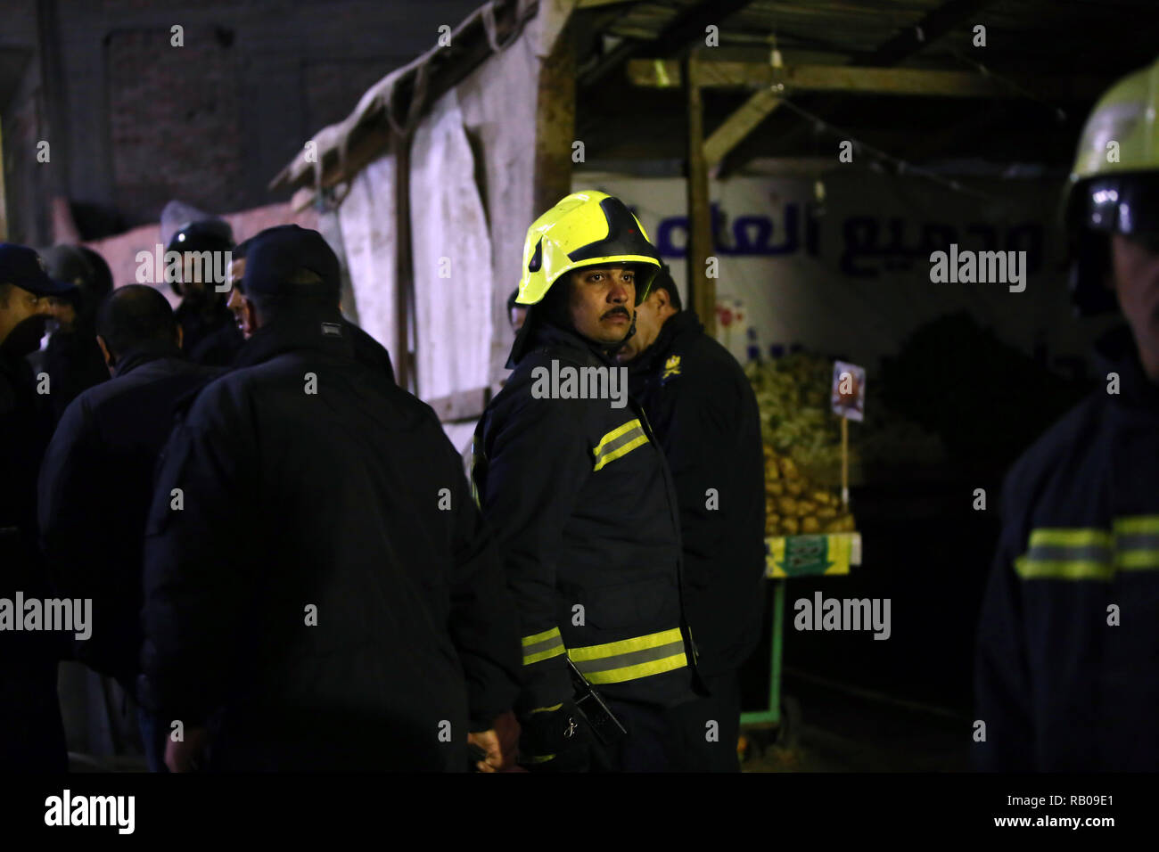 Cairo, Egypt. 6th Jan, 2019. A firefighter works at the scene where the ...