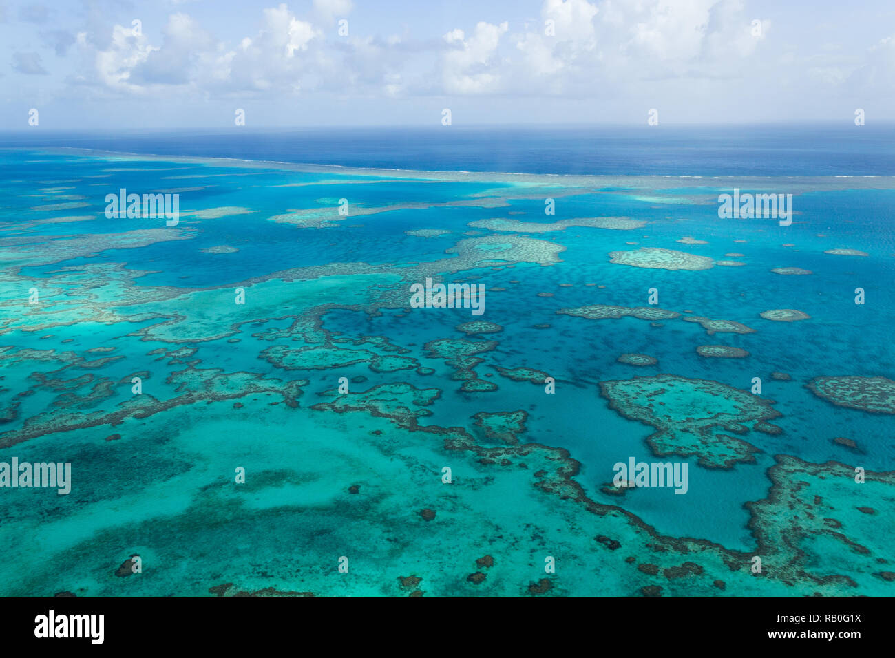 Great Barrier Reef as seen from above from a plane at the coast of the ...