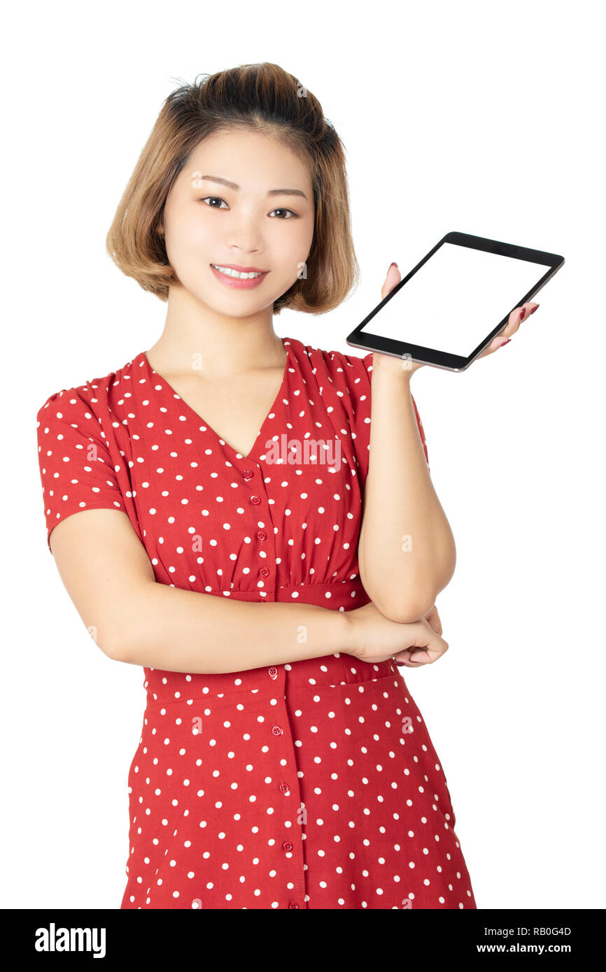 Chinese business woman holding a small tablet computer isolated on a ...