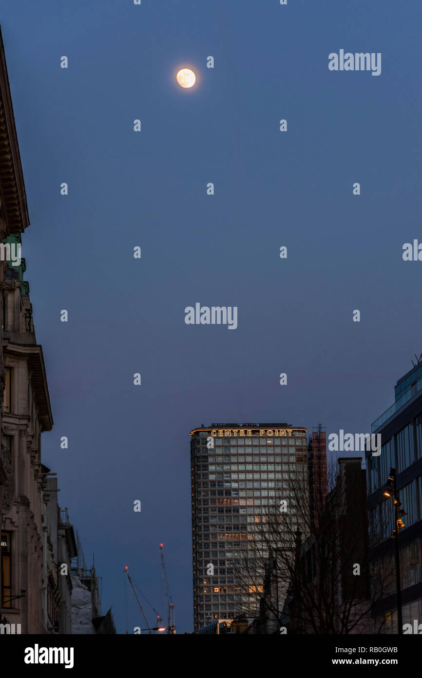 Full moon seen from Oxford street in London, UK Stock Photo - Alamy