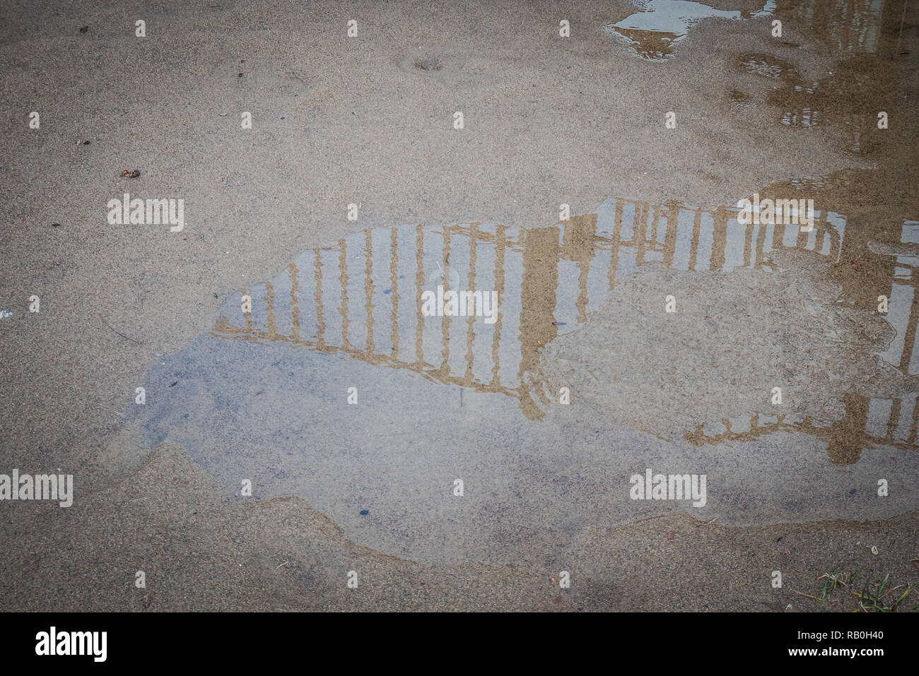 water puddle on sand Stock Photo - Alamy