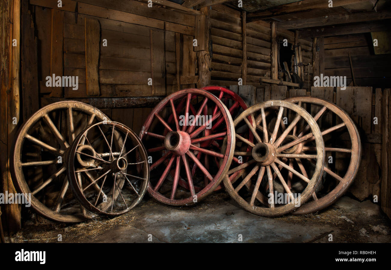 Old wagon wheels in barn in central Virginia Stock Photo - Alamy