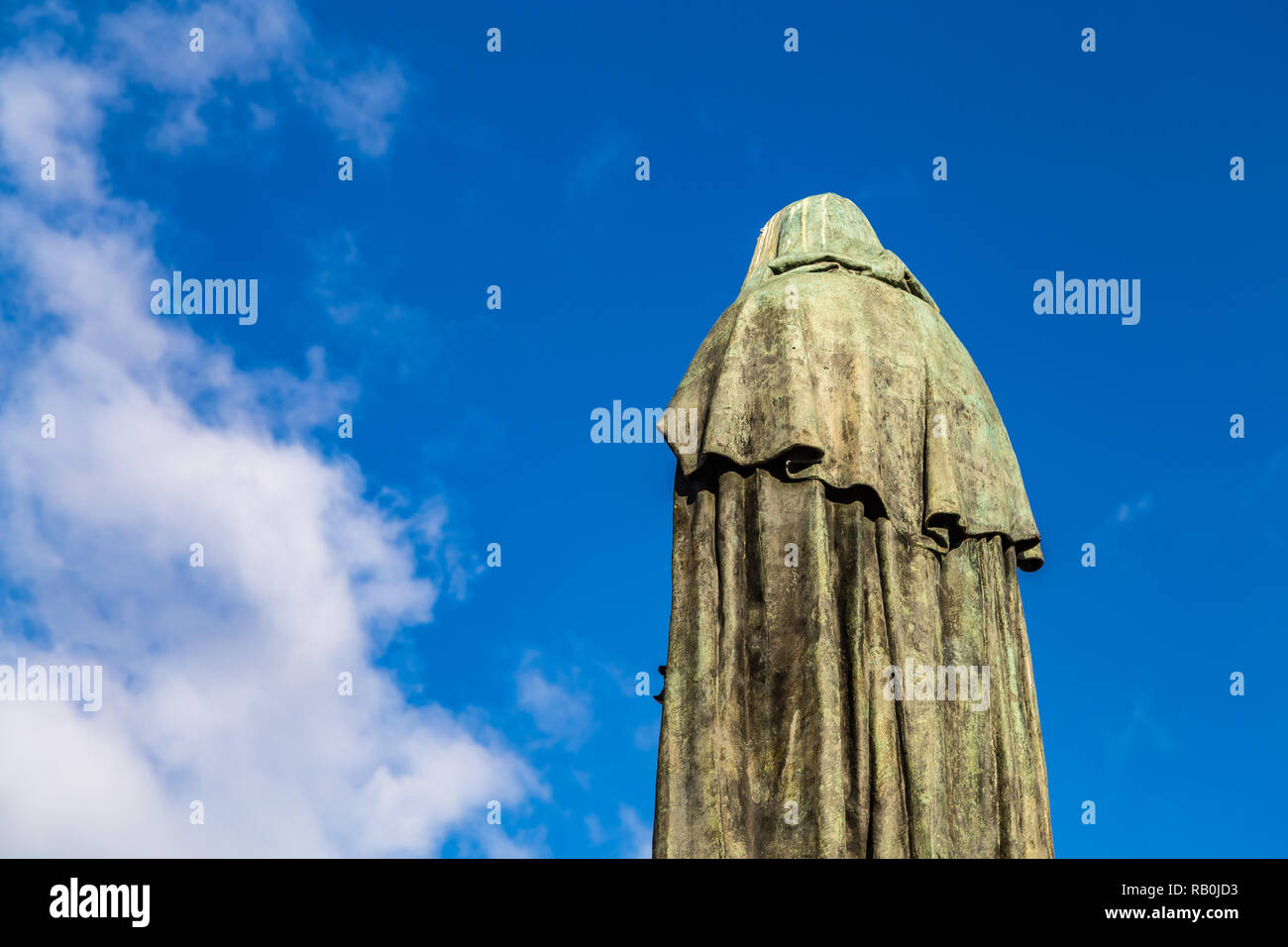 view of back of statue with cloak Stock Photo - Alamy