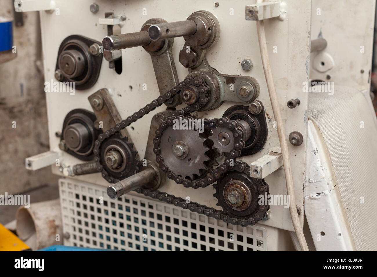 chains and sprockets on the old machine, close up Stock Photo - Alamy