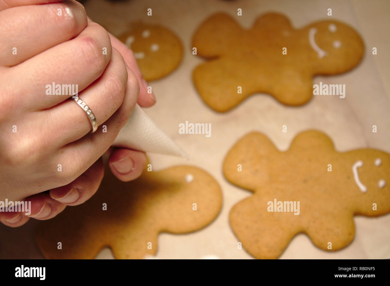 Christmas gingerbread man making process Stock Photo - Alamy
