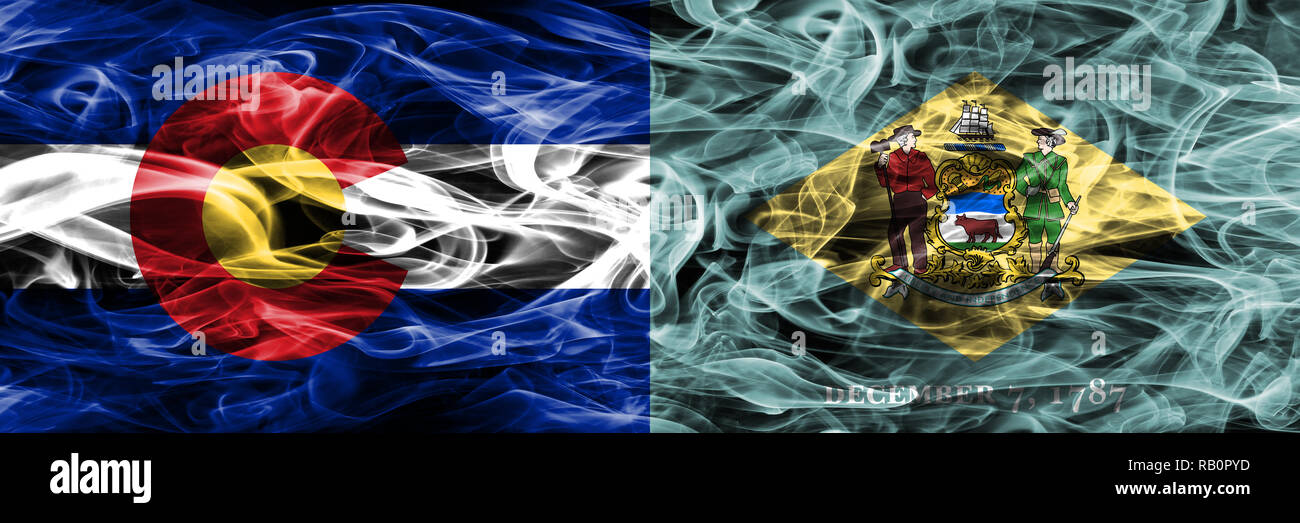 Colorado vs Delaware colorful concept smoke flags placed side by side ...