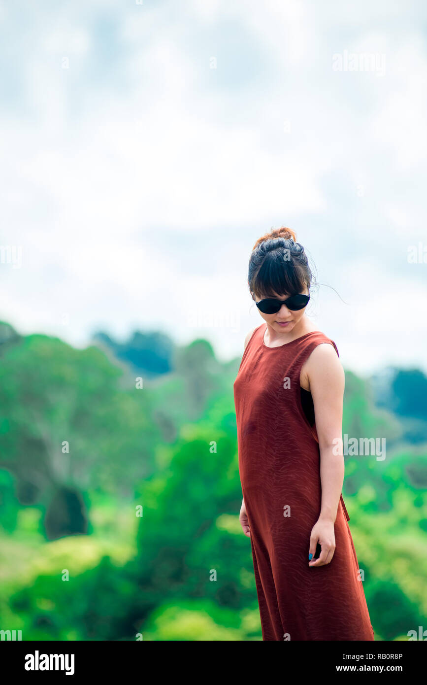 Japanese girl poses for picture in Gold Coast, Australia. Gold Coast is ...