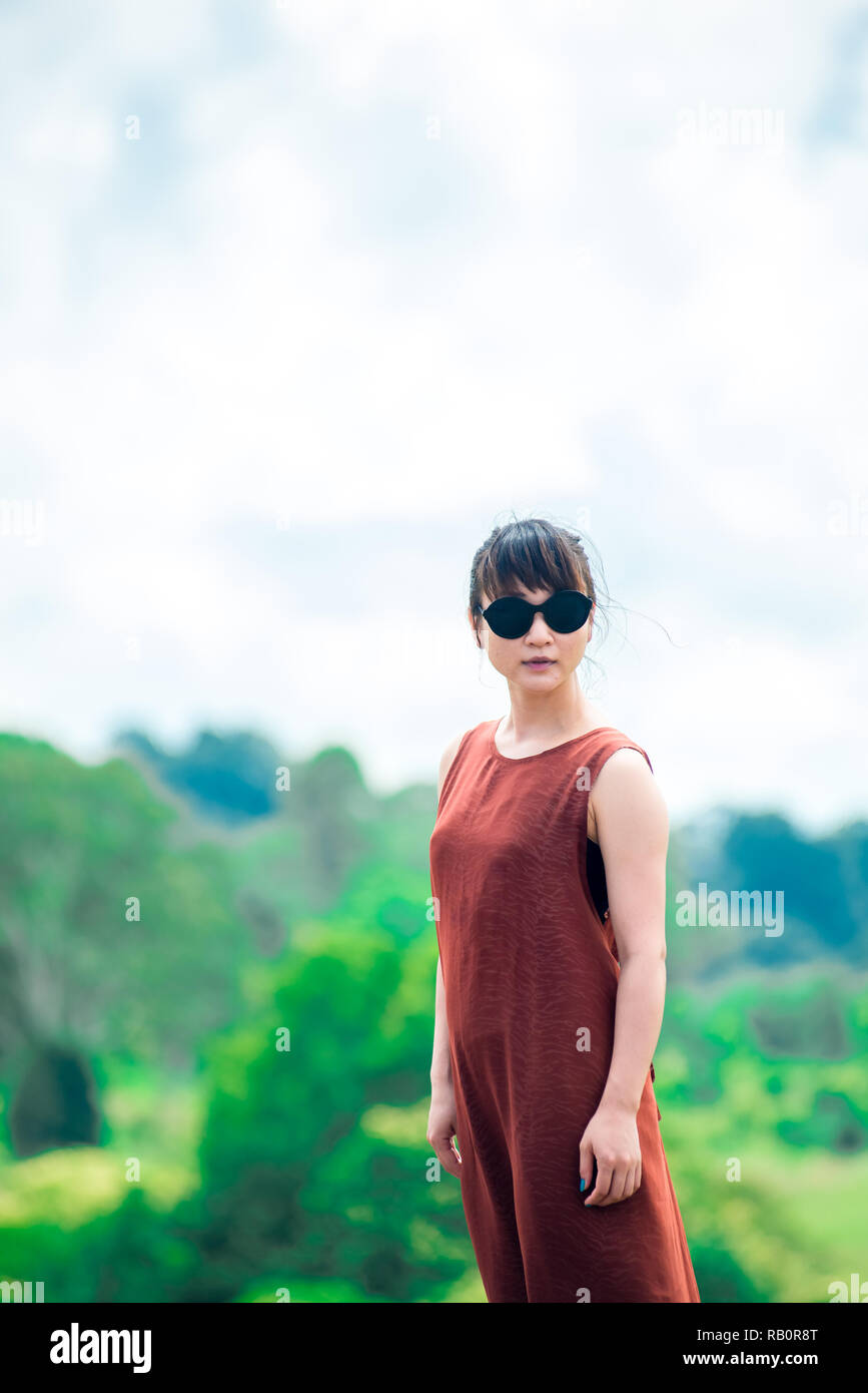 Japanese girl poses for picture in Gold Coast, Australia. Gold Coast is ...
