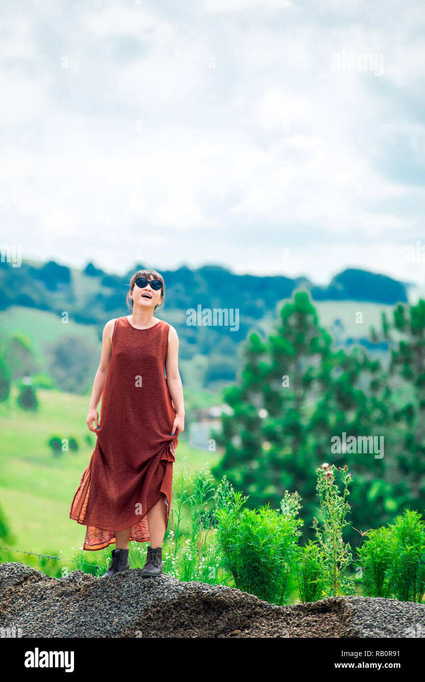 Japanese girl poses for picture in Gold Coast, Australia. Gold Coast is ...
