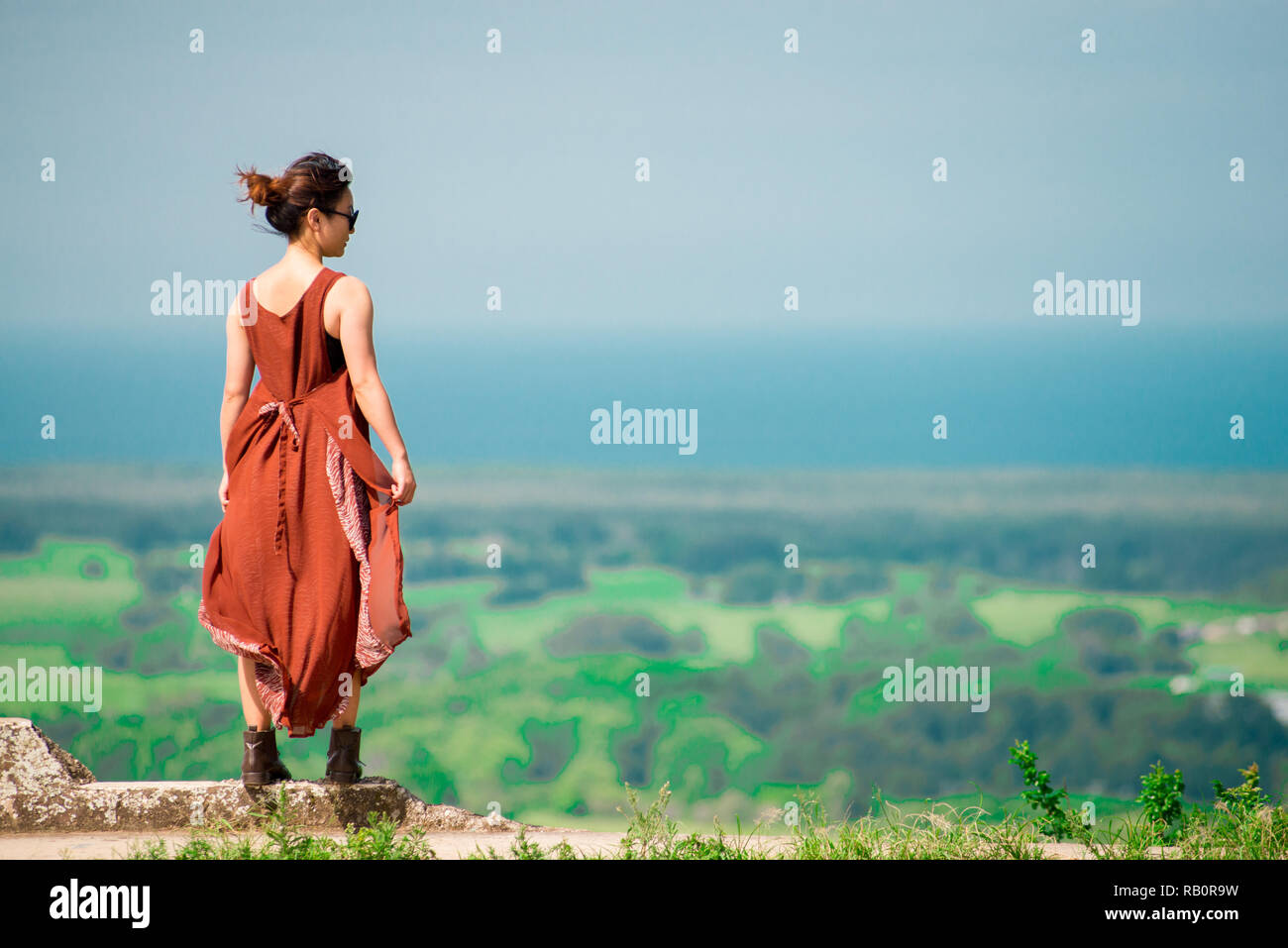 Japanese girl poses for picture in Gold Coast, Australia. Gold Coast is ...