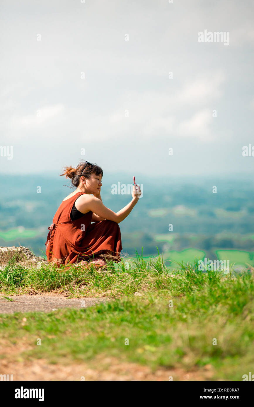 Japanese girl poses for picture in Gold Coast, Australia. Gold Coast is ...