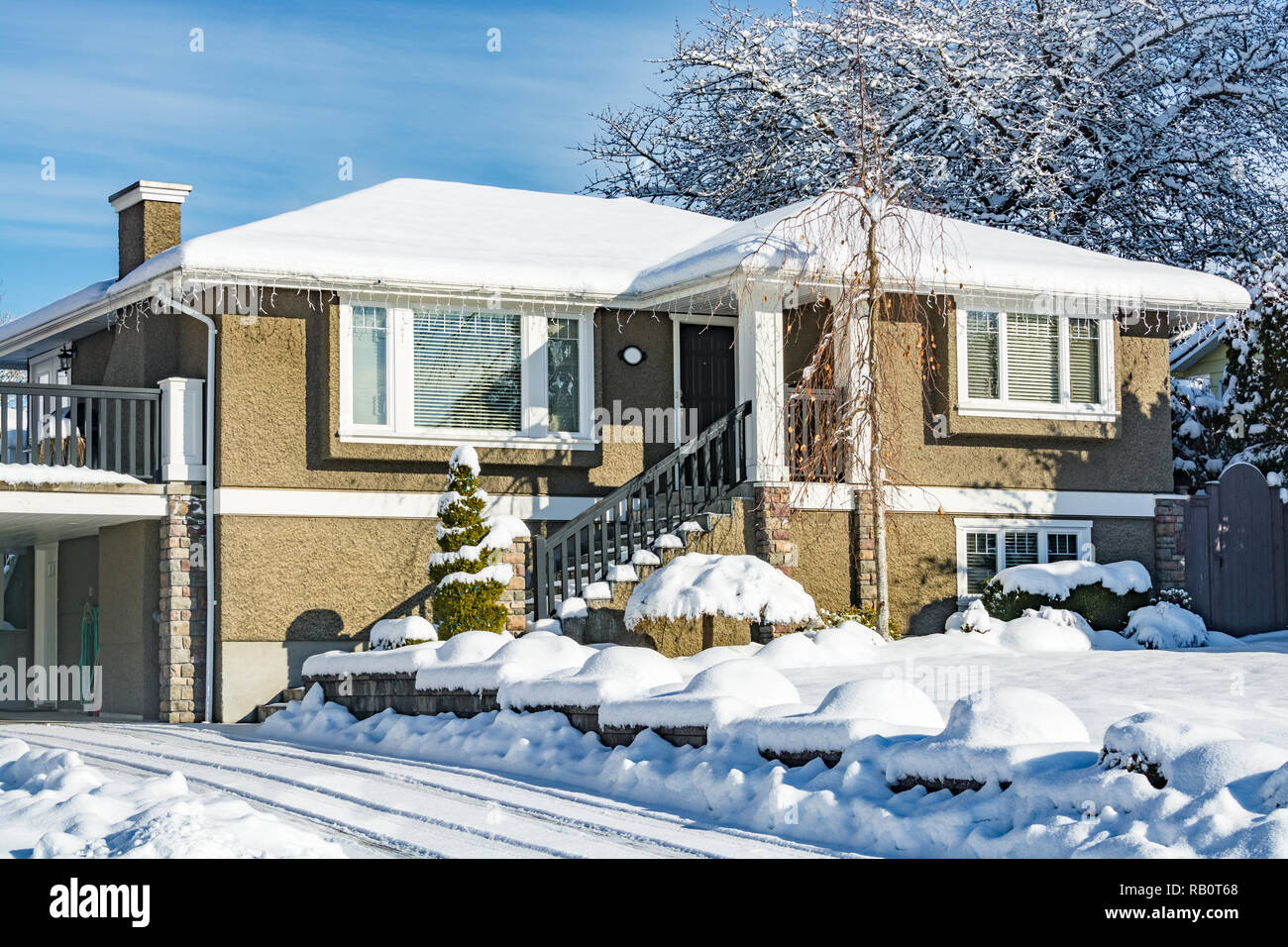 Big family house in snow on winter season in Canada Stock Photo - Alamy